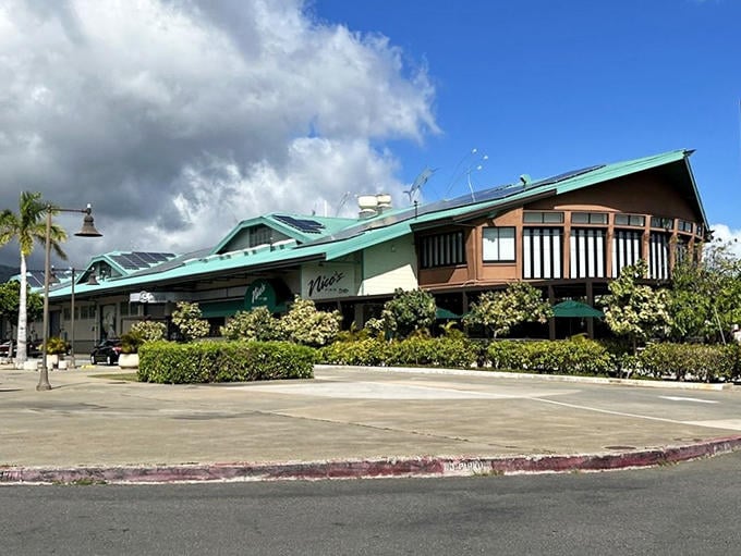 A second view of Nico's shows its distinctive green-trimmed roof and coastal charm. Paradise doesn't always wear a fancy dress.