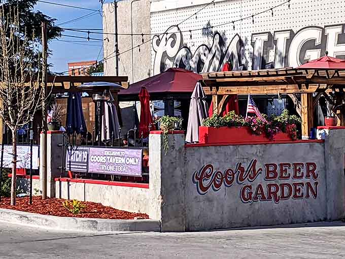 The Beer Garden beckons with patriotic charm and planters that promise cold drinks and warm welcomes inside.