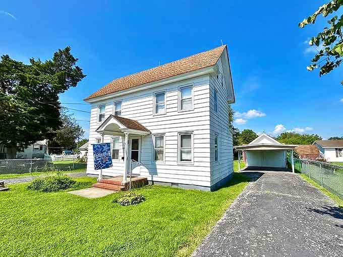 This two-story white colonial with a driveway might be your next address. At under $150K, it's not just a house, it's financial freedom.