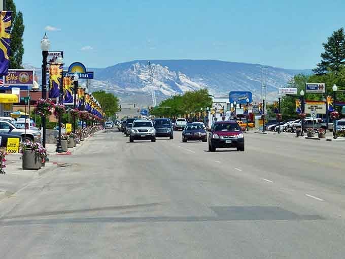 Main Street Vernal greets visitors with hanging flower baskets and mountain views that frame this affordable oasis like nature's own welcome mat.