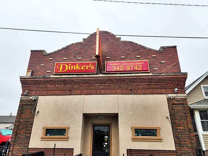 Dinker's classic brick fa&ccedil;ade has become a landmark for burger enthusiasts seeking authentic flavor over flashy appearances.