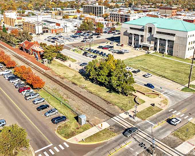 Downtown Norman in autumn glory &ndash; where historic architecture meets small-town charm, and the fall foliage puts on a show that rivals any Broadway production.