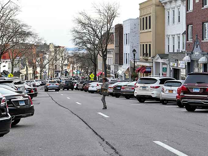Greenwich Avenue slopes toward the harbor like a runway for wealth, where even the parking meters seem to have trust funds.