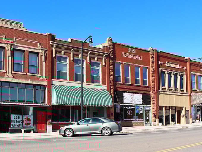 The red brick buildings stands proudly among Perry's well-preserved architectural treasures, its vintage awnings offering shade to window-shoppers and time-travelers alike.