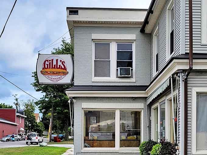 A corner view of Gill's white clapboard building, where sandwich artistry has been happening since before "artisanal" became a marketing buzzword.