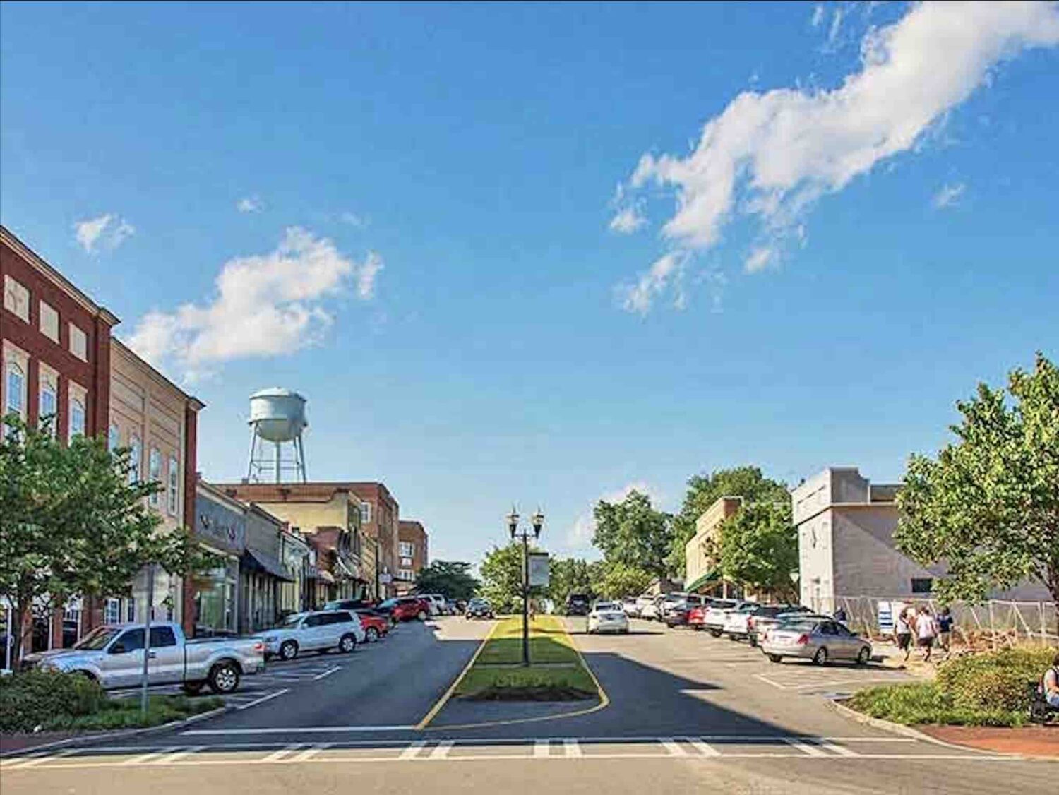 Senoia's Main Street feels like a movie set come to life, with its pristine brick buildings and small-town charm that's both authentic and cinematic.
