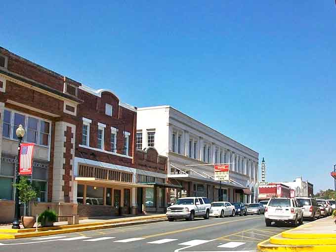 Downtown Leesville's historic buildings stand like colorful sentinels of small-town charm, where affordable dreams and brick-and-mortar stories coexist.