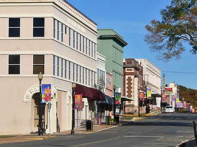 Downtown Leesville's historic buildings stand like colorful sentinels of small-town charm, where affordable dreams and brick-and-mortar stories coexist.