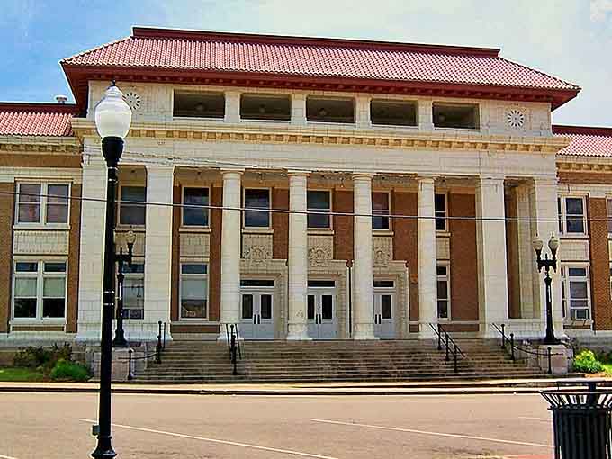 The stately Pontotoc courthouse stands as a testament to small-town grandeur, its columns and red roof creating an architectural exclamation point downtown.