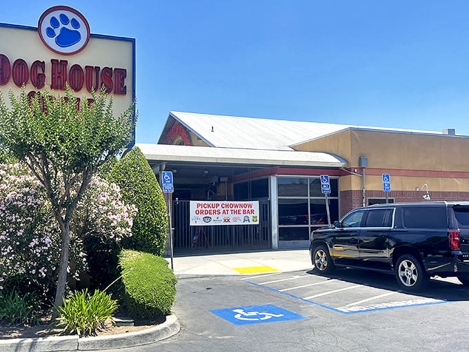 The blue paw print logo welcomes hungry pilgrims to this unassuming temple of tri-tip, where culinary magic happens behind modest walls.