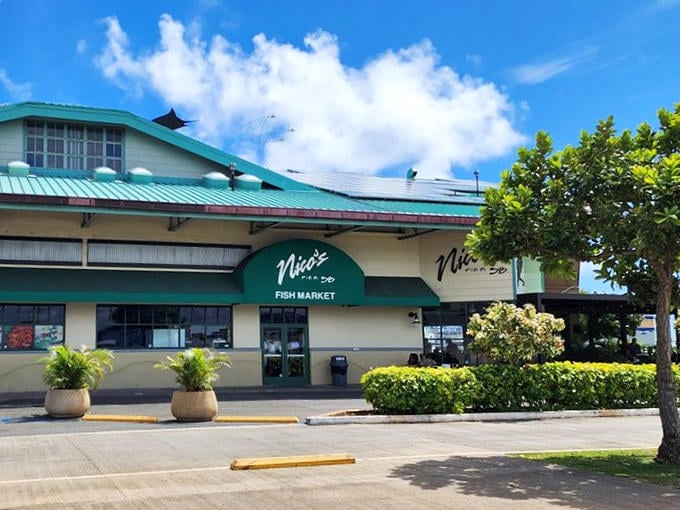 The Fish Market entrance promises the freshest catch. Where seafood goes from boat to plate faster than you can say "aloha."