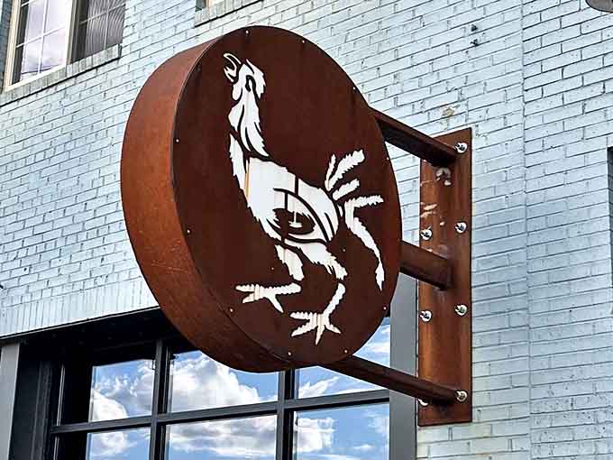 The distinctive rooster sign serves as a beacon for food lovers, drawing prime rib enthusiasts from miles around to this downtown gem.