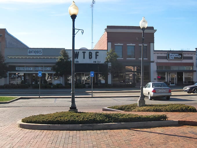 Storefronts and well-kept lawns tell the story of Troy, where neighbors still wave and front porches aren't just for show.