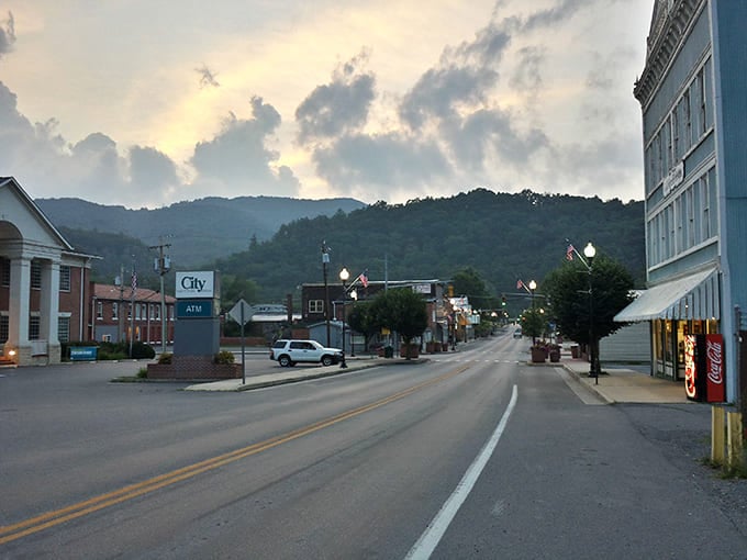 Dusk settles over Marlinton's quiet streets, where the mountains cradle the town like a protective parent watching over a sleeping child.