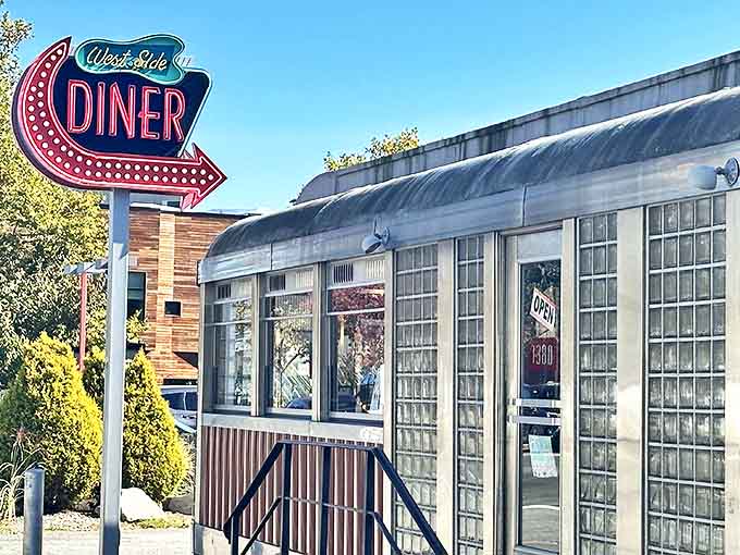 The iconic neon sign points the way to time-travel &ndash; West Side Diner's gleaming stainless steel exterior promises comfort food that would make your grandmother proud.