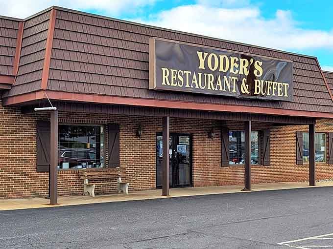 The unassuming exterior of Yoder's hides a culinary wonderland within, like finding Narnia in a brick-and-shingle wardrobe.