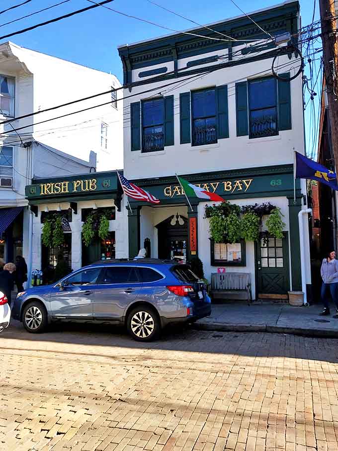 The brick street leading to this white-and-green haven feels like something from a travel documentary&mdash;except you're the lucky host discovering it.