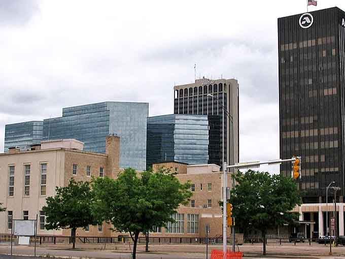 Modern glass meets classic brick in Amarillo's business district, where the big sky reminds you you're still in Texas, partner.