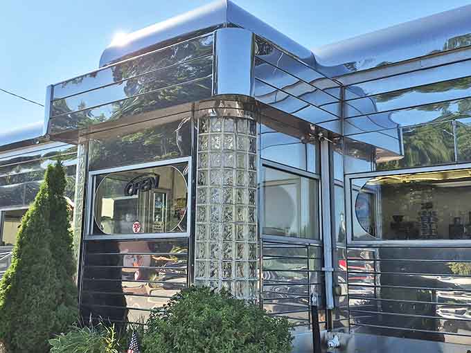 The gleaming stainless steel exterior isn't just eye-catching&mdash;it's a time machine disguised as architecture. Classic Americana at its finest.