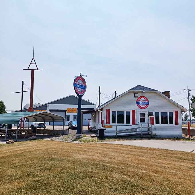 A humble white building with a bold sign that promises more flavor per square foot than most fancy downtown restaurants could dream of delivering.