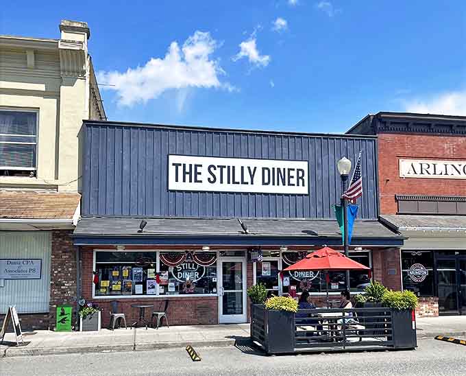 Blue skies match blue awnings at The Stilly, where the outdoor parklet offers prime people-watching during your pancake pilgrimage.