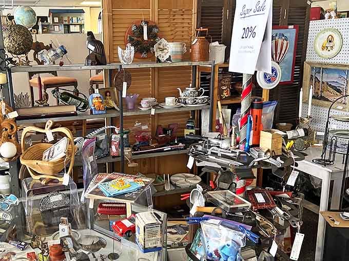 A treasure hunter's paradise where globes, teacups, and vintage tools await discovery&mdash;complete with tempting sale signs.