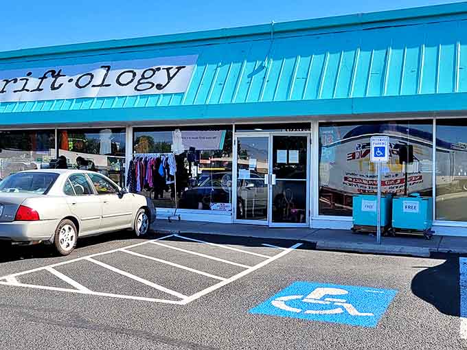 The turquoise storefront beckons like a portal to bargain paradise. This unassuming exterior hides a wonderland of treasures within.