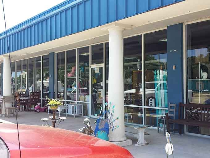 Garden benches and outdoor decor spill onto the sidewalk, like appetizers before the main course of vintage delights inside.