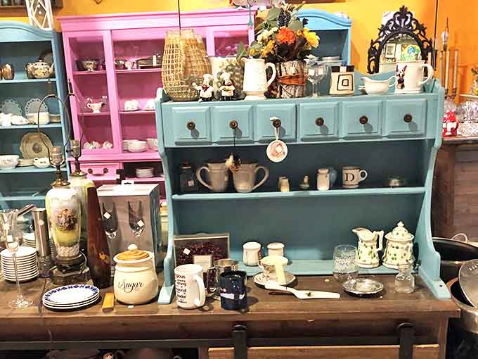 Colorfully upcycled furniture and charming vintage housewares create vignettes that could inspire an entire home redesign during your thrifting adventure.