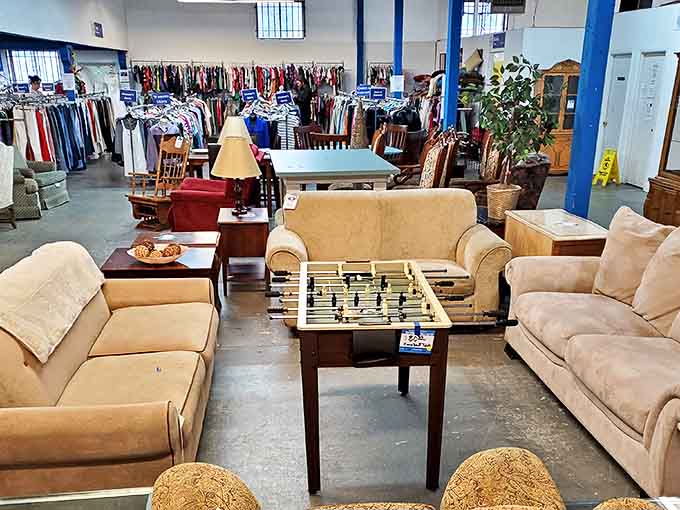 The spacious furniture section showcases quality pieces at bargain prices, from comfortable sofas to entertainment options like this foosball table.