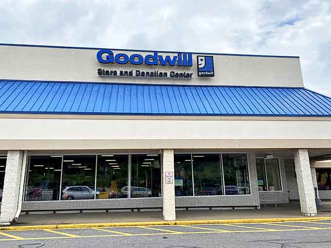 The blue-roofed treasure chest of Bridgeport beckons with its simple exterior, hiding a warehouse of possibilities within. Goodwill's unassuming storefront is the gateway to thrifting paradise.