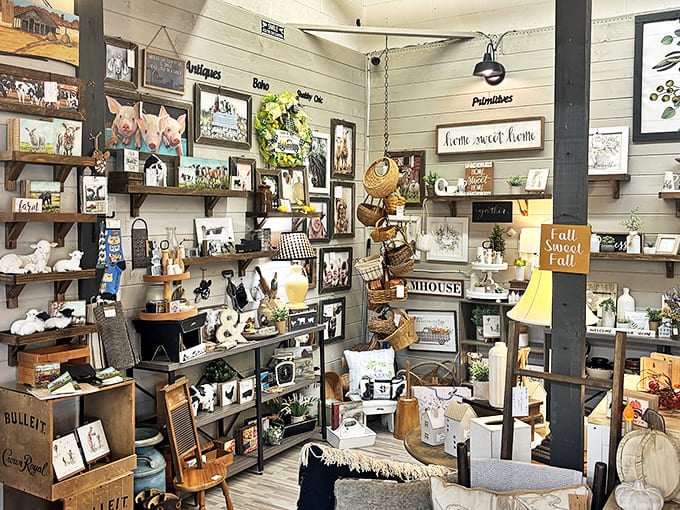 Farmhouse chic meets rustic elegance in this meticulously arranged vendor booth showcasing home d&eacute;cor treasures for every taste.