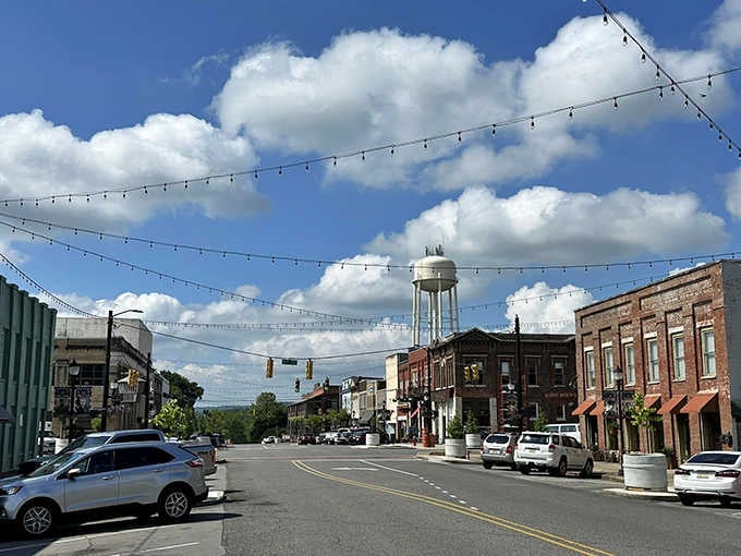 Downtown Tuscumbia looks like it was plucked straight from a Hallmark movie set. That water tower stands guard over brick storefronts that haven't changed their tune in decades.
