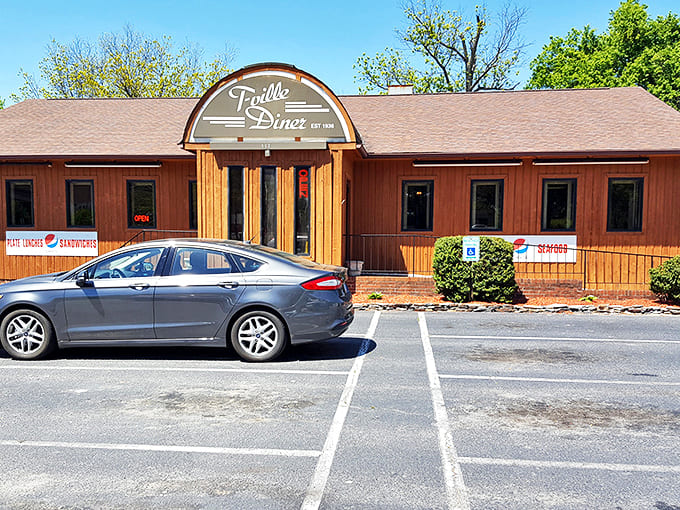 A slice of Americana awaits behind those wooden walls and distinctive arched sign, where breakfast dreams come true for less than ten bucks.