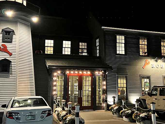 The iconic blue exterior of Robert's Maine Grill stands like a beacon for seafood lovers, promising maritime delights within those New England clapboard walls.