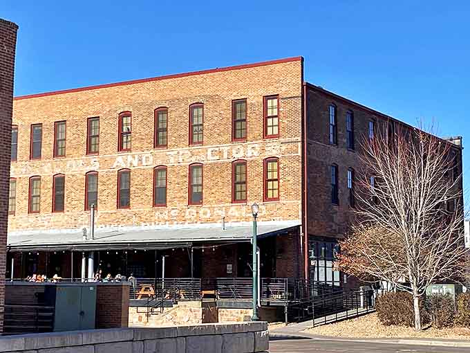 The historic brick building housing Bread & Circus stands proudly in downtown Sioux Falls, a sandwich sanctuary waiting to transform your lunch expectations.
