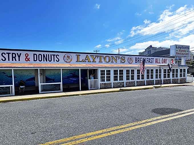 The iconic blue and white facade of Layton's stands like a beacon for breakfast lovers, promising donut nirvana just steps from Ocean City's sandy shores.