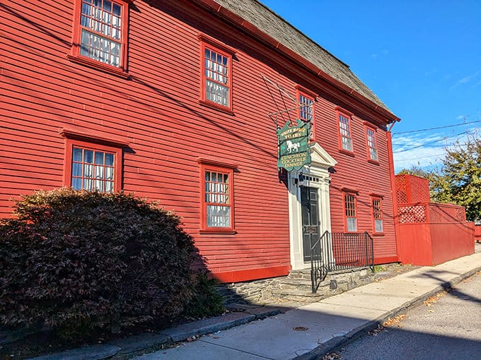 That classic red clapboard exterior isn't just Instagram-worthy &ndash; it's witnessed more American history than a Ken Burns documentary marathon.