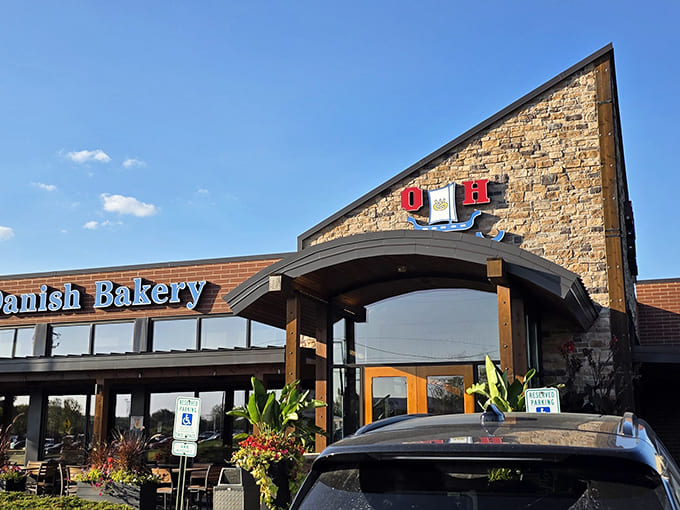 The iconic triangular stone entrance with its bright O&H logo has become a beacon for sweet-toothed travelers, a landmark as beloved to Wisconsinites as cheese curds and Packers victories.