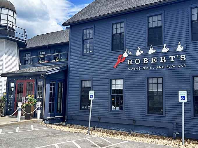 The iconic blue exterior of Robert's Maine Grill stands like a beacon for seafood lovers, promising maritime delights within those New England clapboard walls.