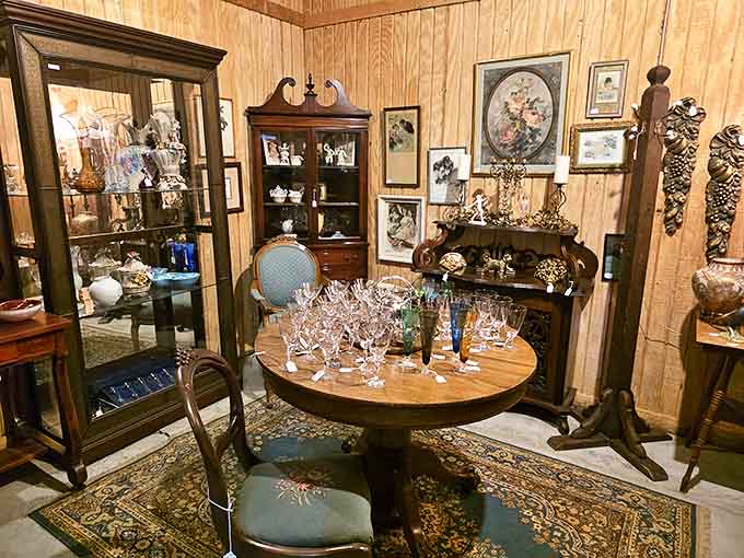 A perfectly staged vignette where crystal stemware catches the light, surrounded by heirloom furniture that whispers tales of dinner parties from decades past.