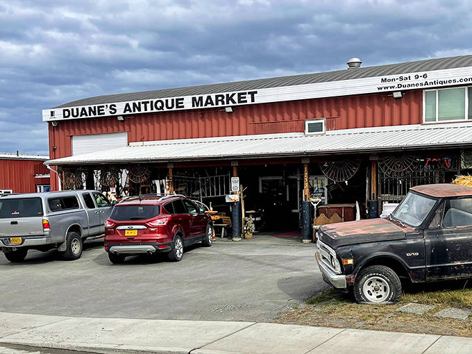 The distinctive orange-topped building stands out against Alaska's dramatic sky, welcoming treasure hunters with its unassuming exterior.