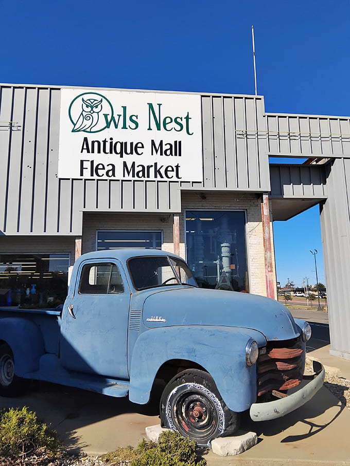 That vintage blue pickup truck against the silver building is like finding Elvis at a modern concert&mdash;beautifully out of time yet perfectly at home.