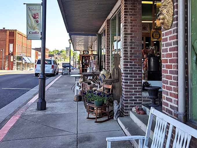 The charming streetscape of downtown Cadiz provides the perfect backdrop for this antiquing paradise, where sidewalk displays offer a tantalizing preview of the wonders waiting inside.