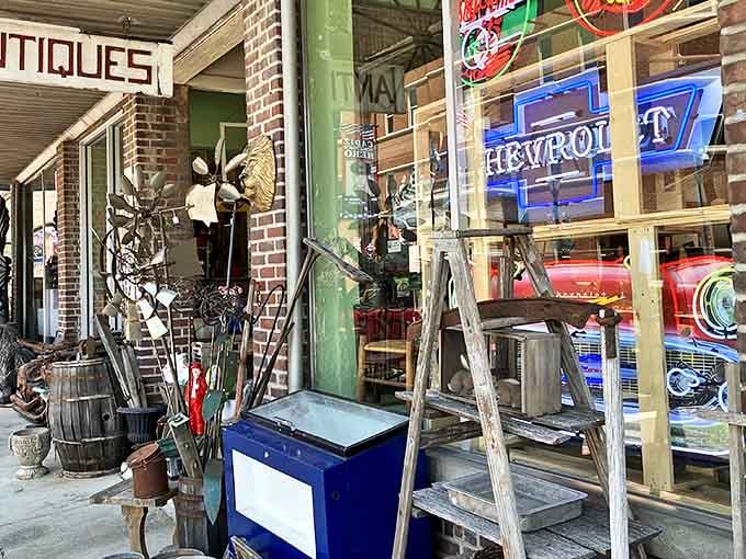 The storefront spills its treasures onto the sidewalk, with vintage ladders and neon signs beckoning like old friends waving you inside.