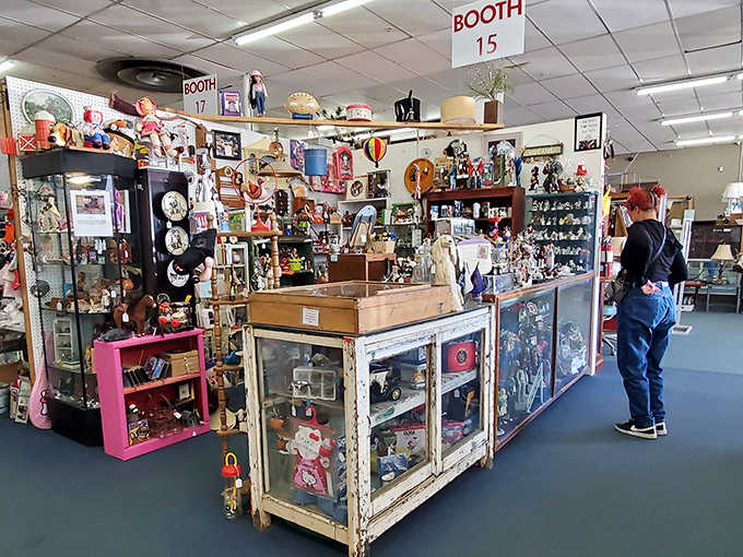 Vendor booths overflow with collectibles and curiosities, each display case a miniature museum waiting for eager treasure hunters.