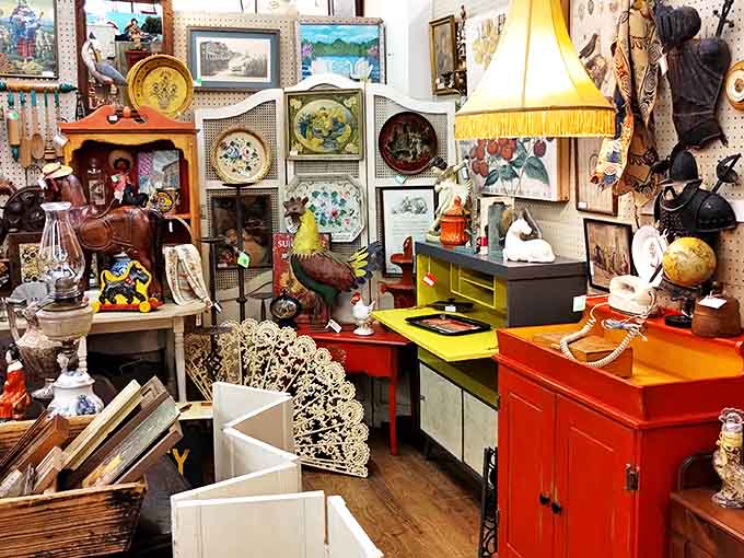 Organized chaos at its most beautiful&mdash;where colorful cabinets, vintage lamps, and decorative plates create a treasure hunter's paradise that would make Indiana Jones switch careers.