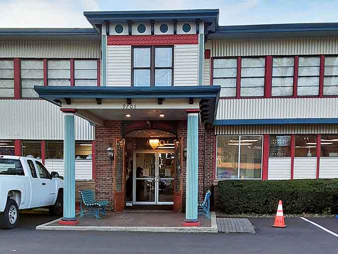 The welcoming entrance to Grand Antique Mall in Cincinnati, with its distinctive columns and architectural details inviting visitors to step back in time.