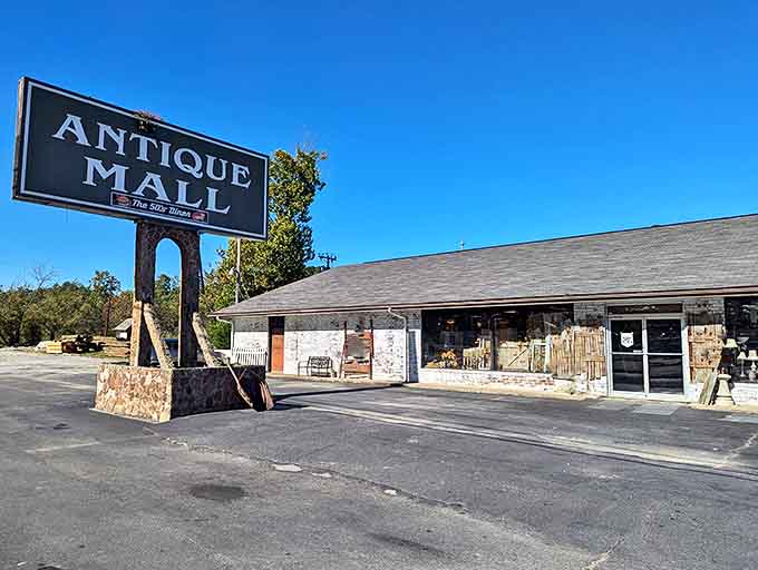 The unassuming exterior of Pigeon Forge's Antique Mall hides a universe of treasures within, like finding Narnia in your neighbor's closet.