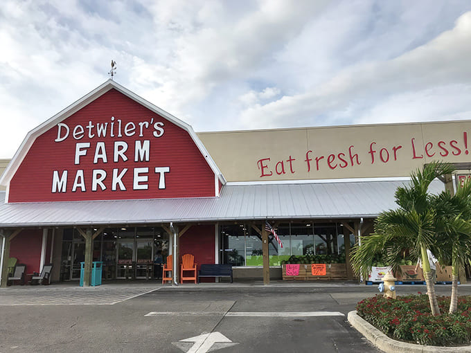 Morning light bathes Detwiler's distinctive barn-red storefront in golden sunshine. Like Disney World for dinner ingredients, but with prices that won't require a second mortgage.